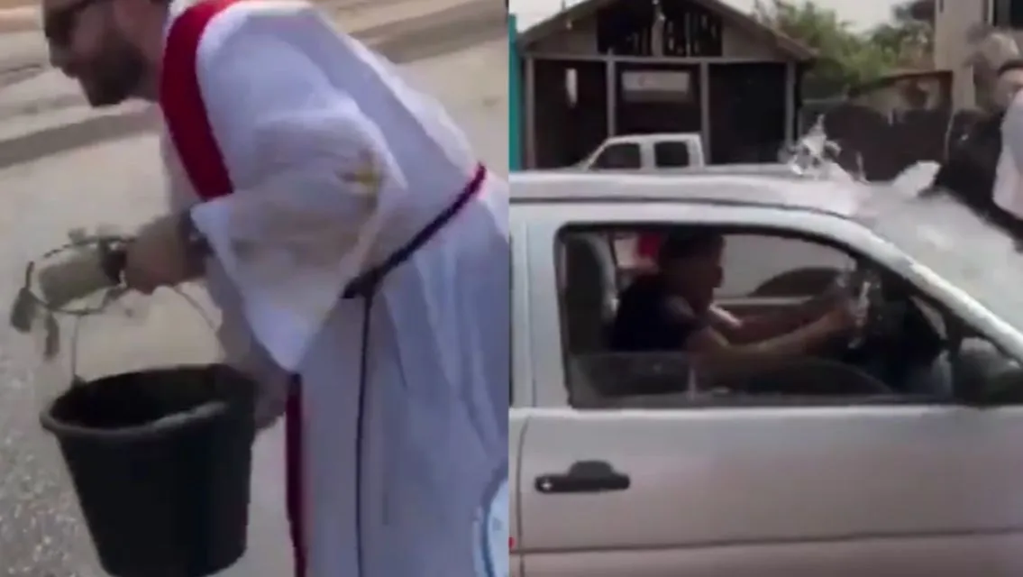 Diácono viraliza após 'baldada' de bênção em veículos e pedestres